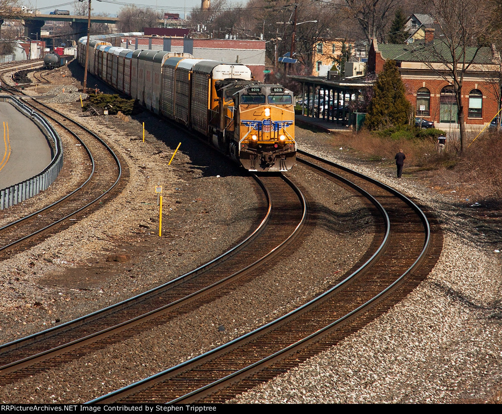 UP 6016 has just started moving again as it passes this guy who had walked way to far down the ...